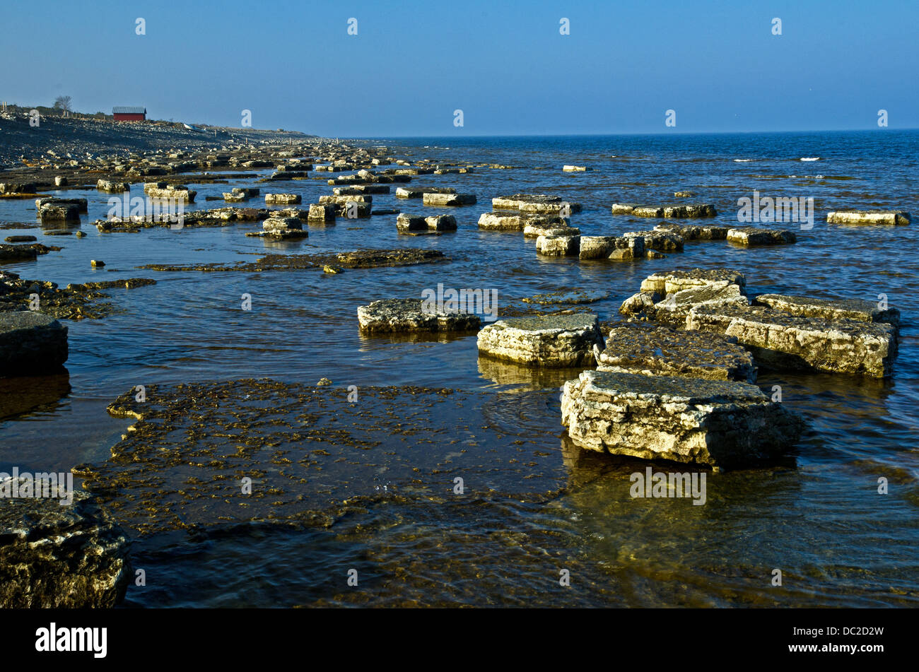 Flat sea with rocks hi-res stock photography and images - Alamy