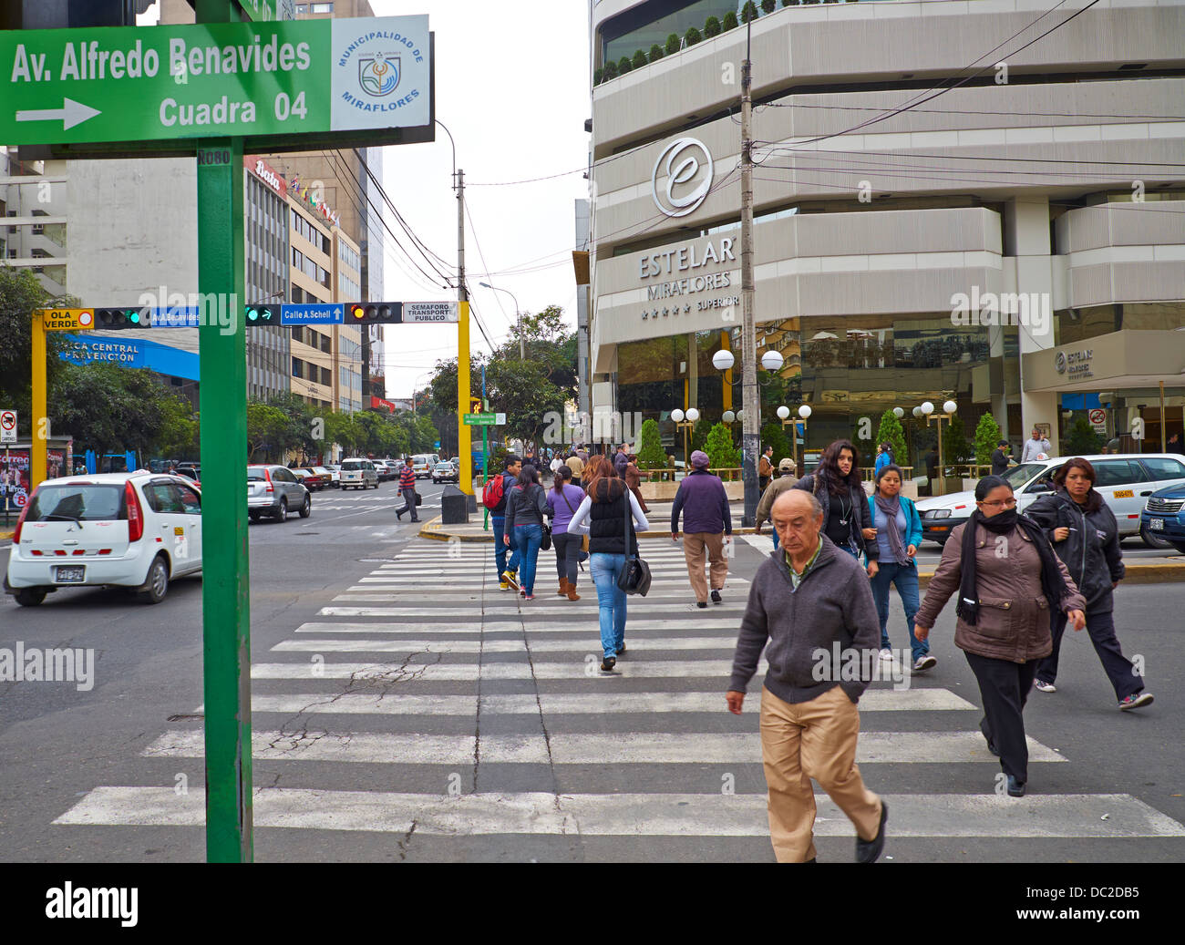 Pedestrians at a road crossing in the Miraflores district of Lima in ...