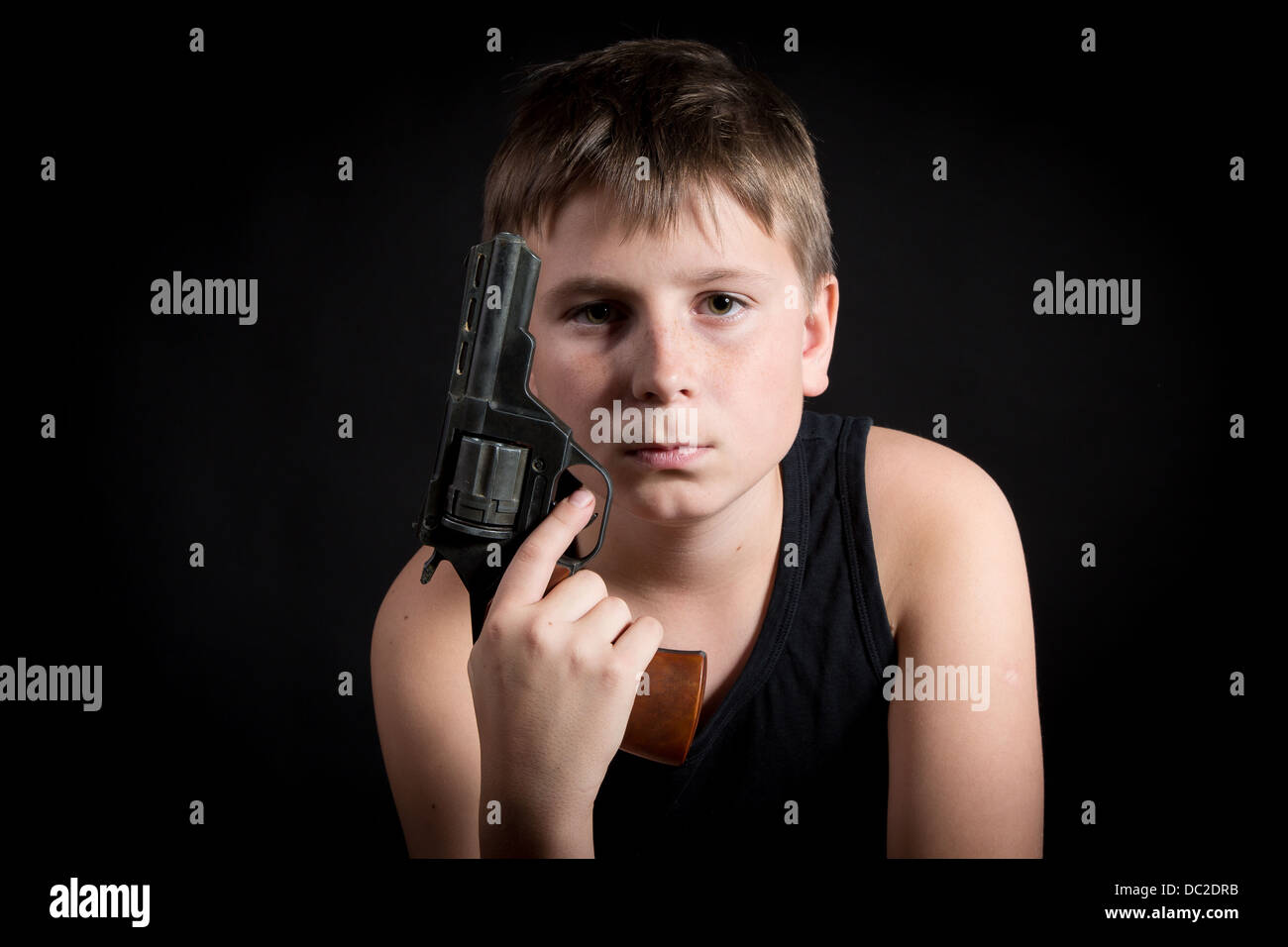 Adolescent with gun hi-res stock photography and images - Alamy
