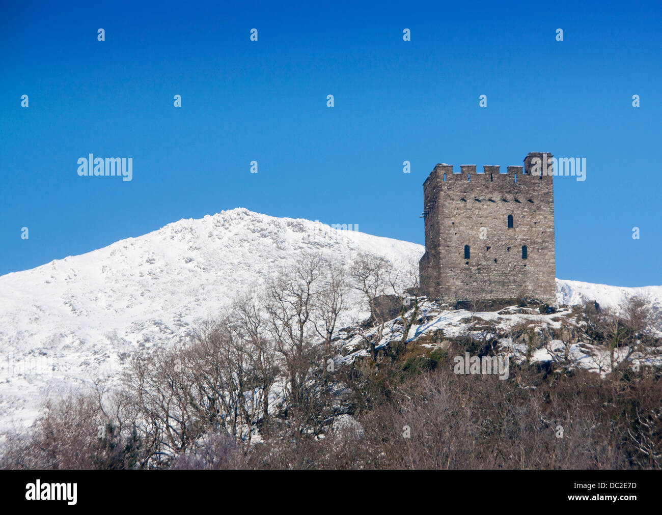 Dolwyddelan Castle and the summit of Moel Siabod in snow Conwy County ...