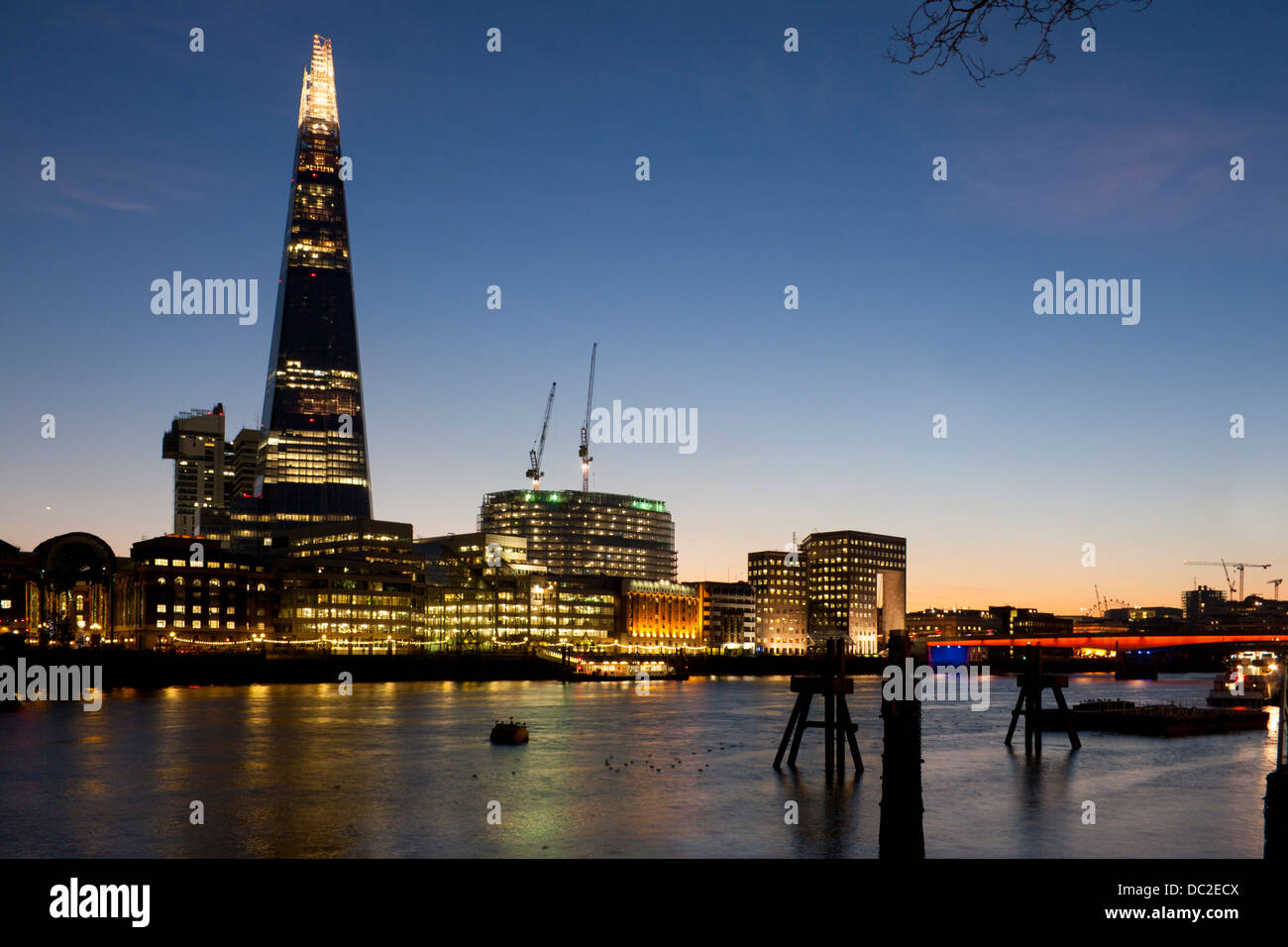 The Shard skyscraper by Renzo Piano and River Thames at twilight / dusk ...