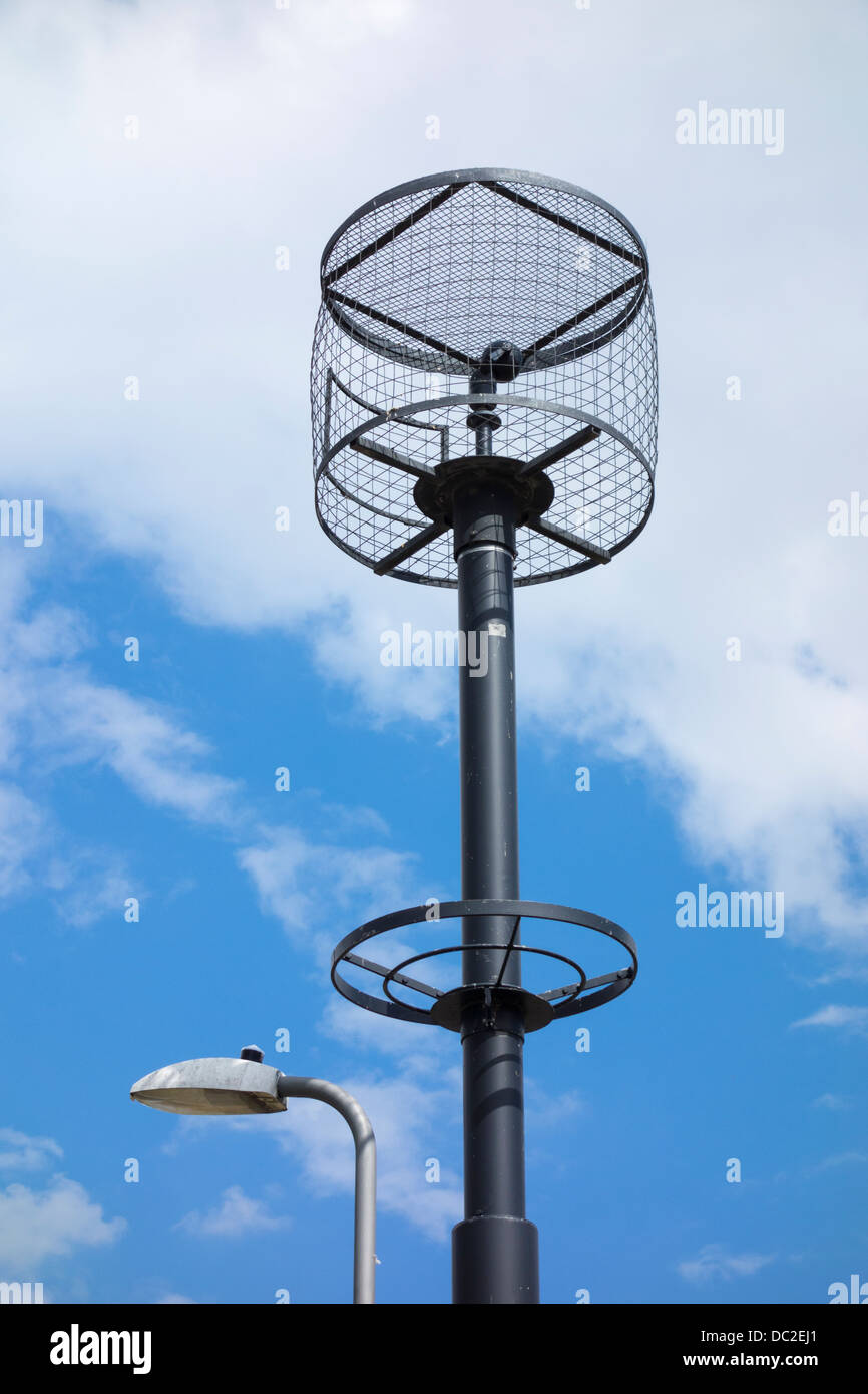 CCTV camera in protective cage on street in England, UK Stock Photo - Alamy