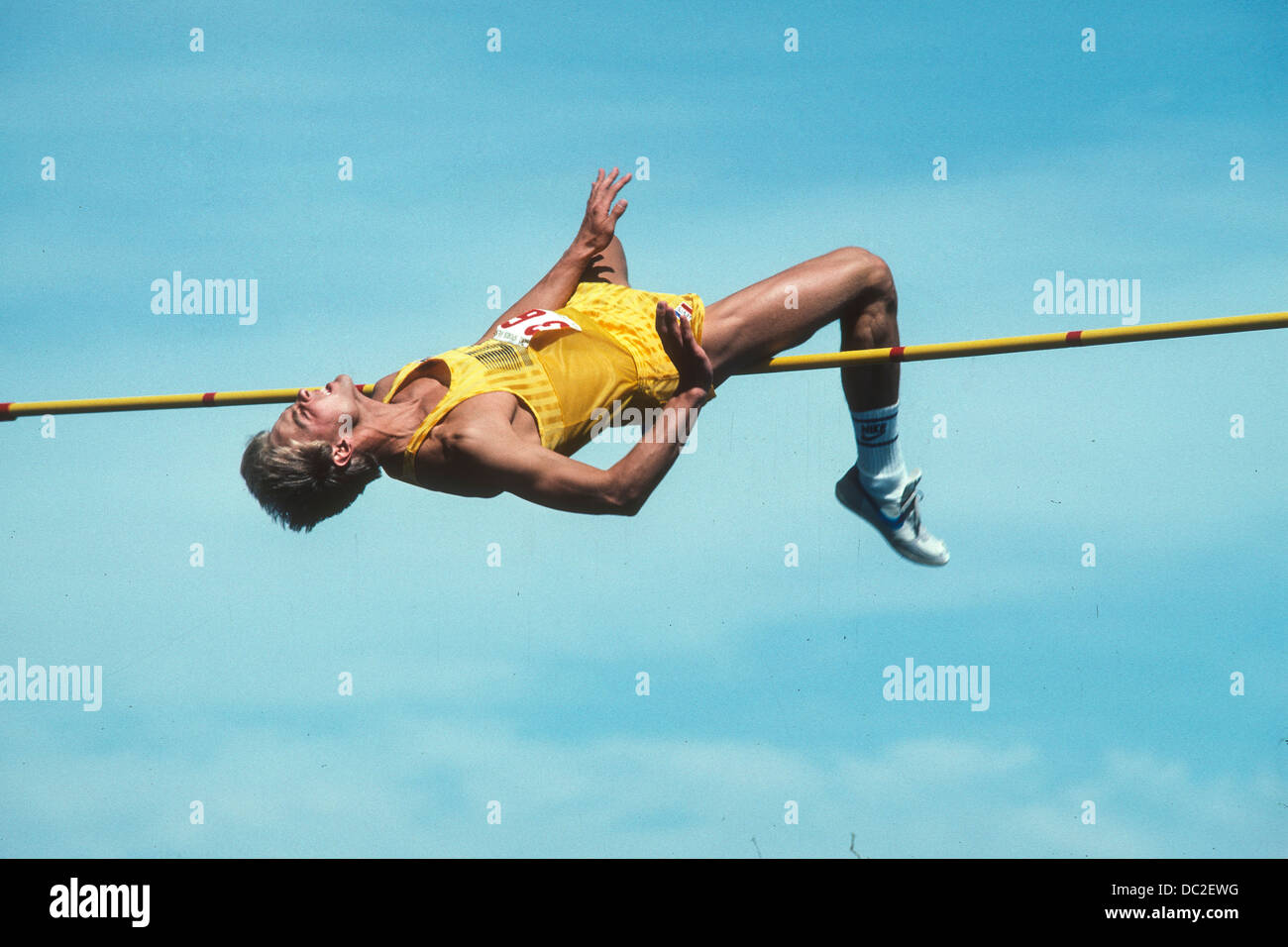 Male high jumper in action Stock Photo - Alamy