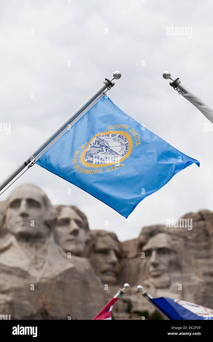 South Dakota Flag blowing above Mount Rushmore National Memorial near ...