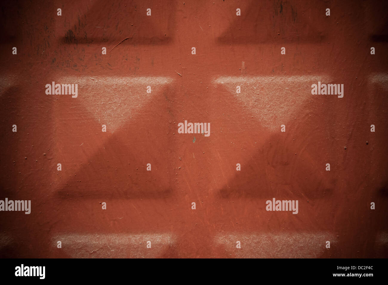 Terra Cotta Colored Iron Door background tiled with square pattern ...