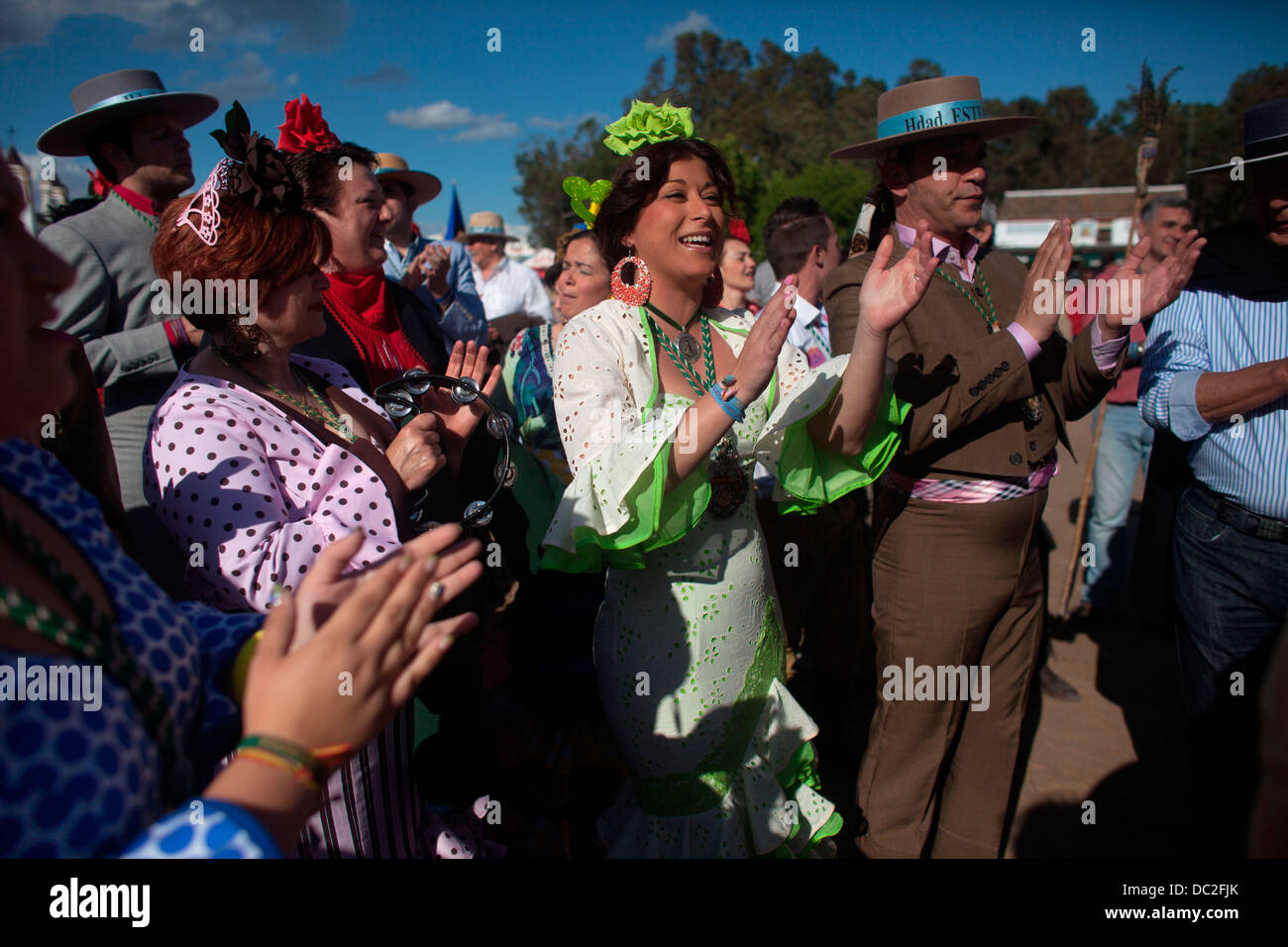 Pilgrims clap as they sing and dance Flamenco music during the ...