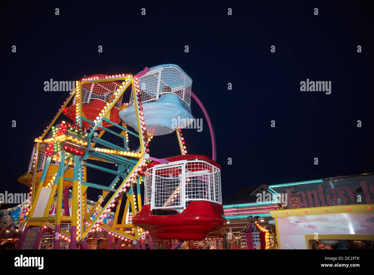 Fun fair at night Stock Photo - Alamy