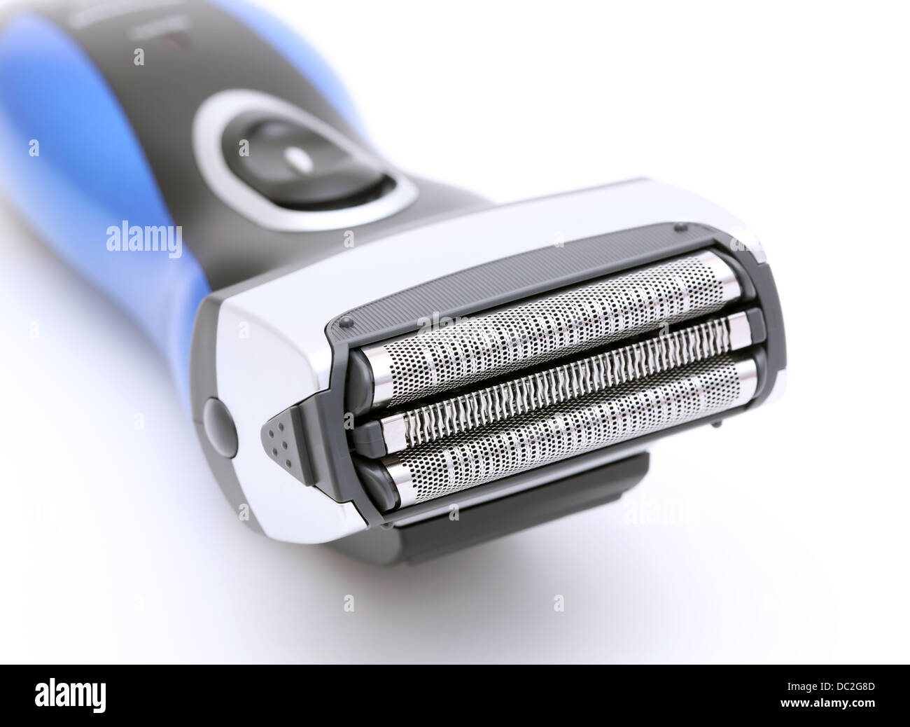 Electric shaver on white background Stock Photo - Alamy