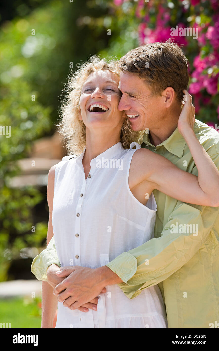 A mature couple hugging Stock Photo - Alamy