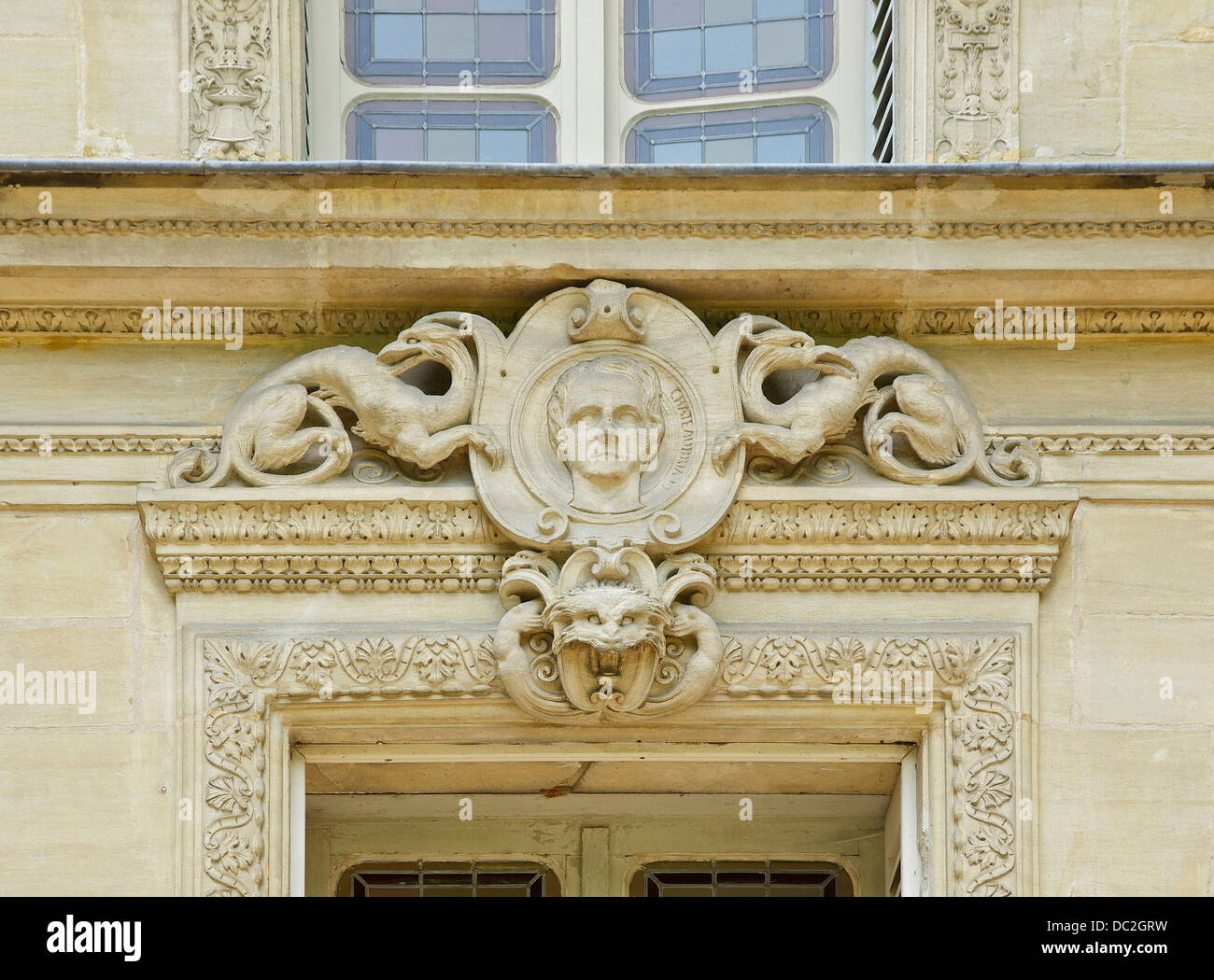 A sculpted mascaron depicting the face of François-René de ...
