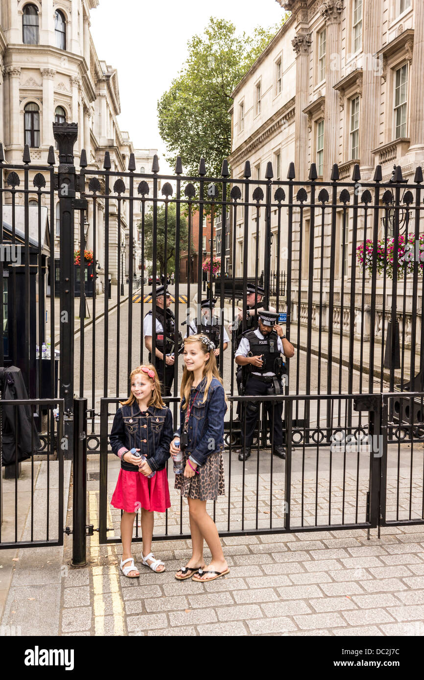 Tourists in front of Number 10 Downing Street Security Gate Stock Photo ...