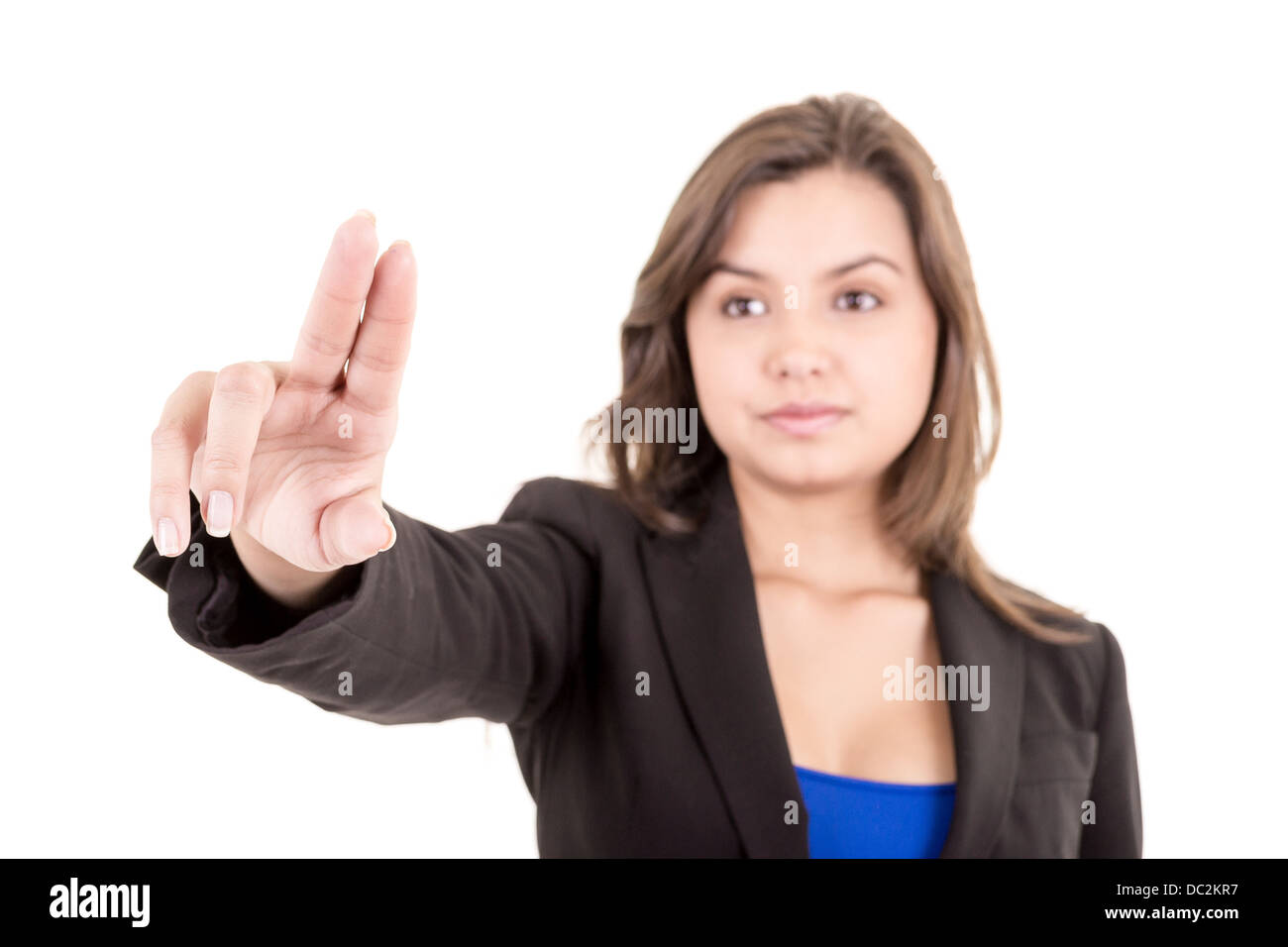 Pretty woman pointing at something in the air Stock Photo - Alamy