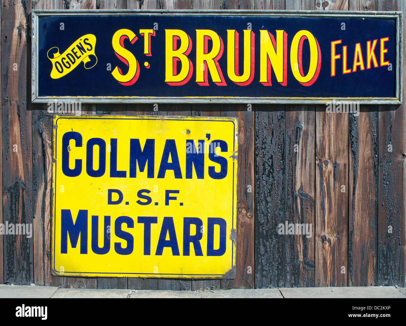 Enamel advertising signs Stock Photo - Alamy