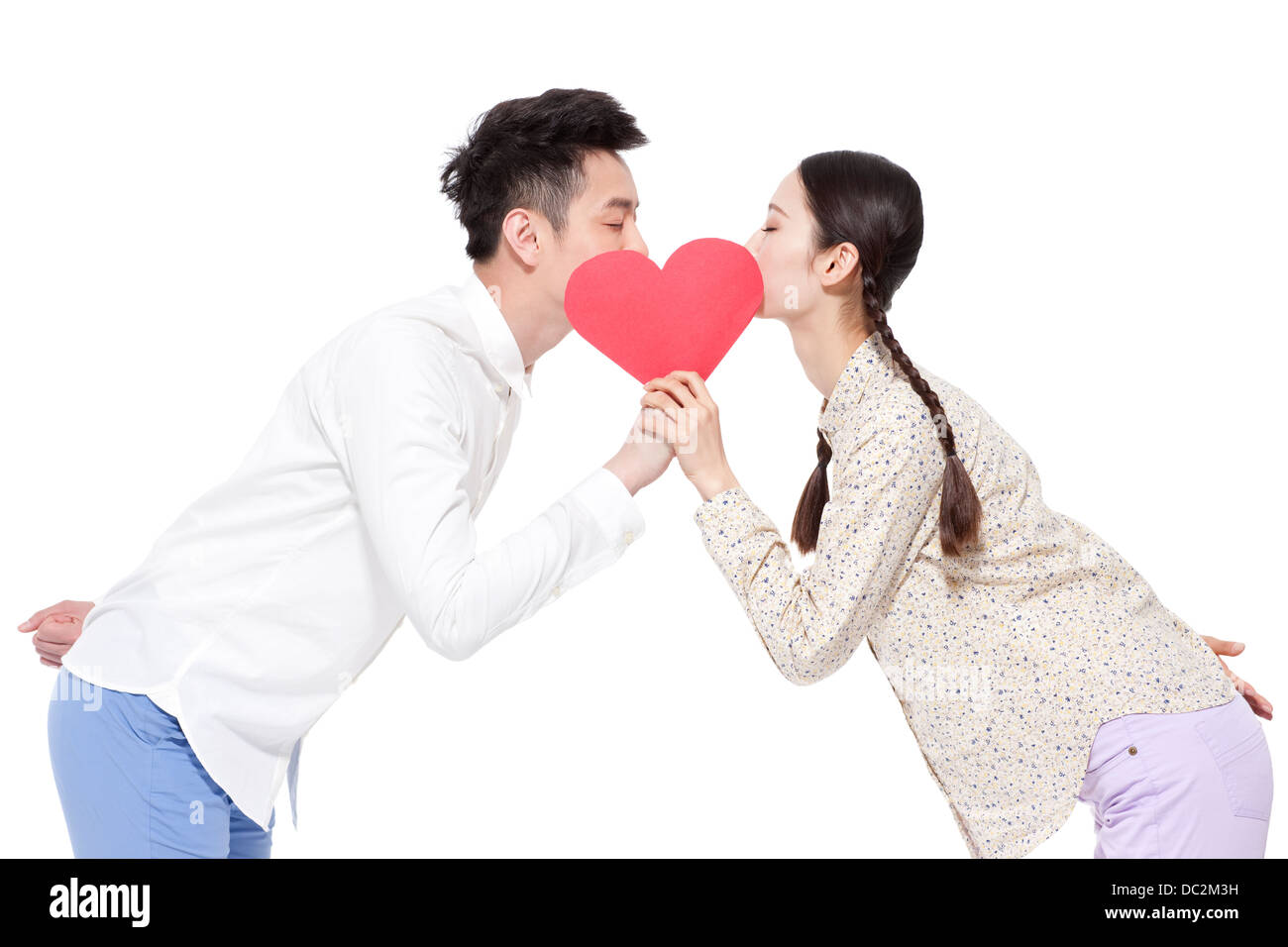 Retro couple kissing Stock Photo - Alamy