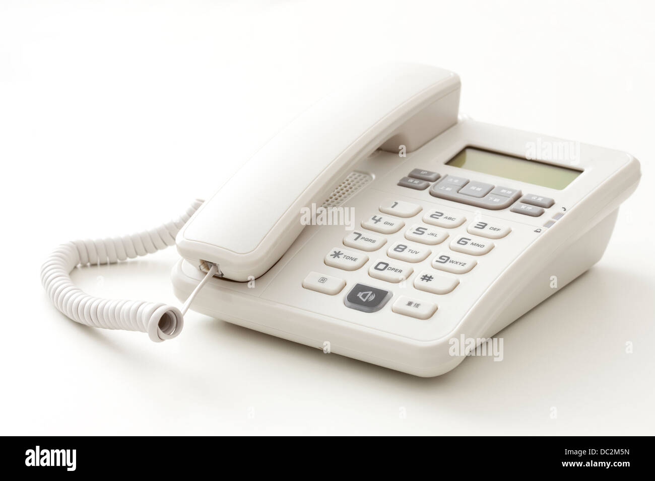 Telephone on desk Stock Photo - Alamy