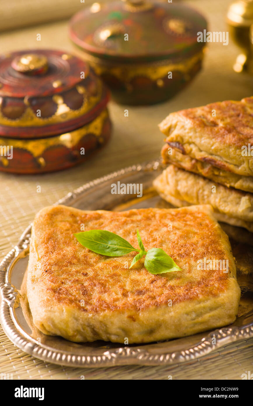 mutabbaq a popular arab ramadan food where bread if stuffed with meat ...