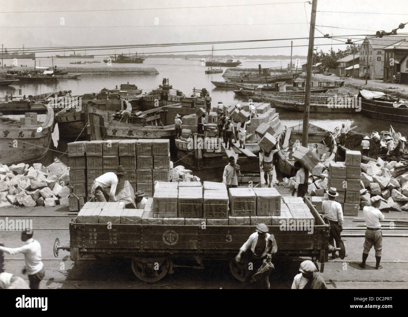 Shipping raw silk in the harbor of Yokohama. Pictured in the early ...