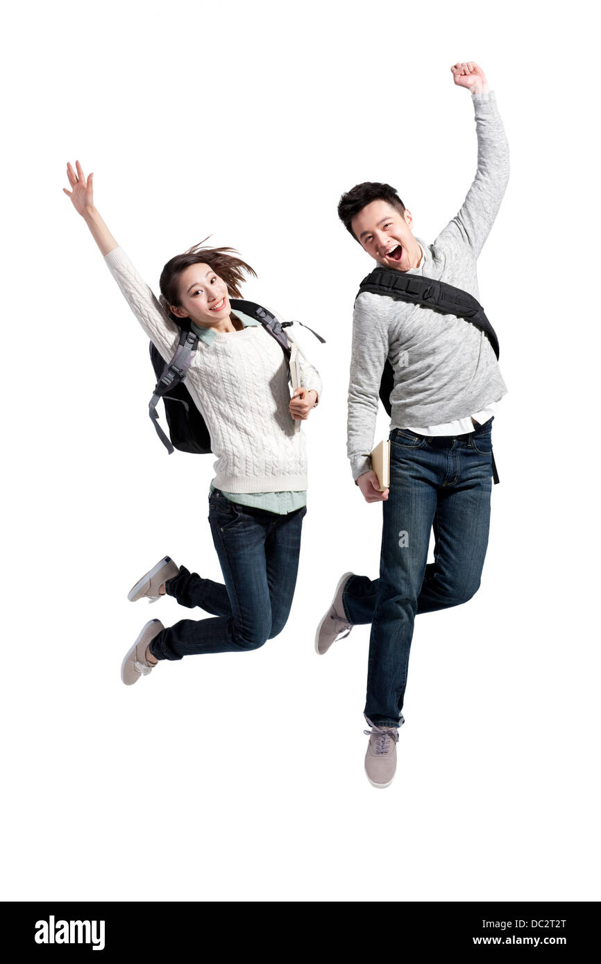 Excited young couple jumping in hi-res stock photography and images - Alamy