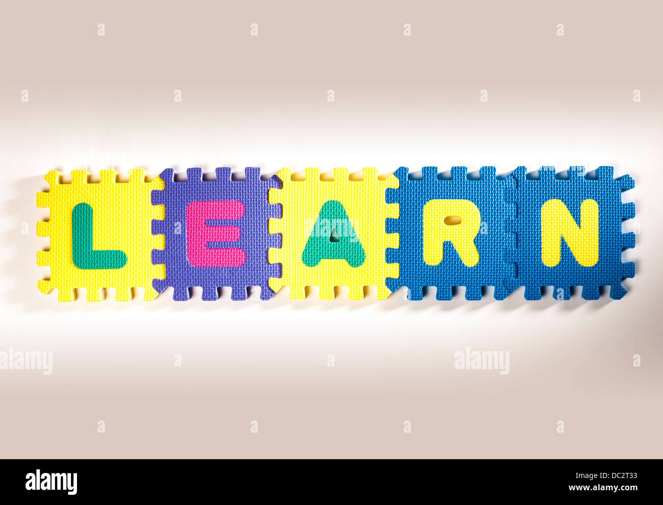 Interlocking foam letters spelling the word Learn Stock Photo - Alamy