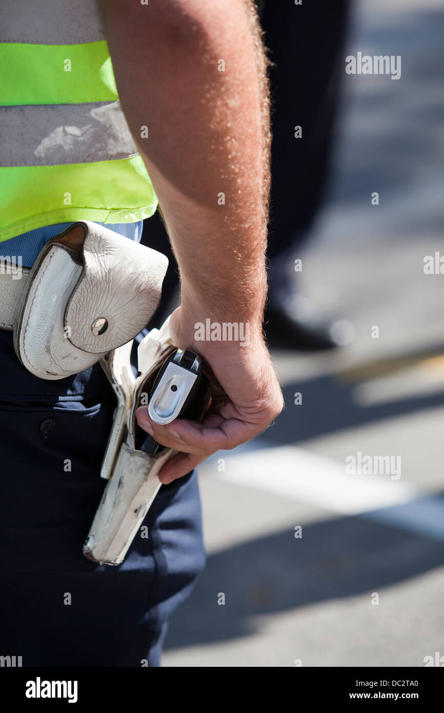 police officer with handgun on their holster Stock Photo - Alamy