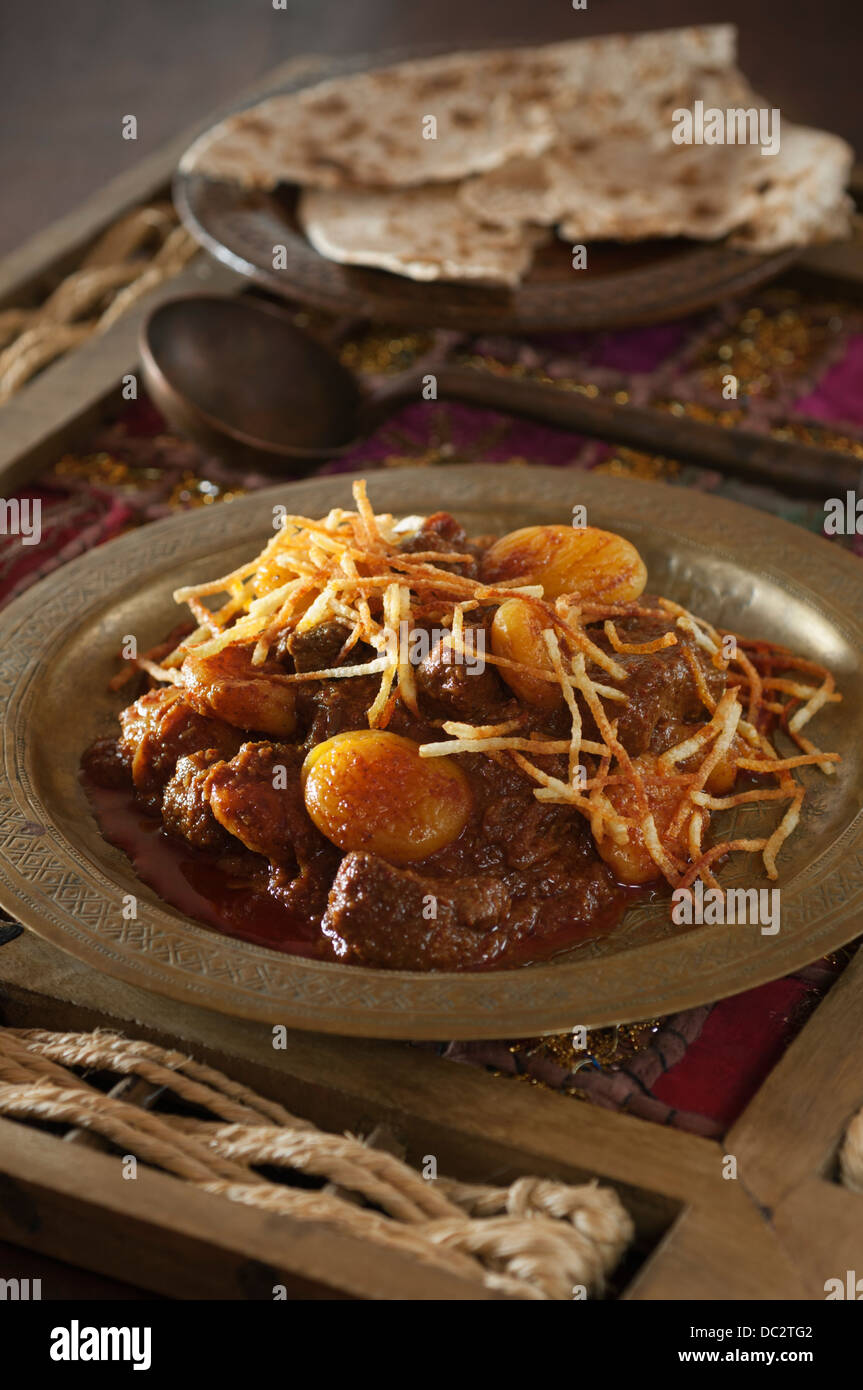 Sali Jardaloo boti. Lamb with apricots and potato straws India Food ...