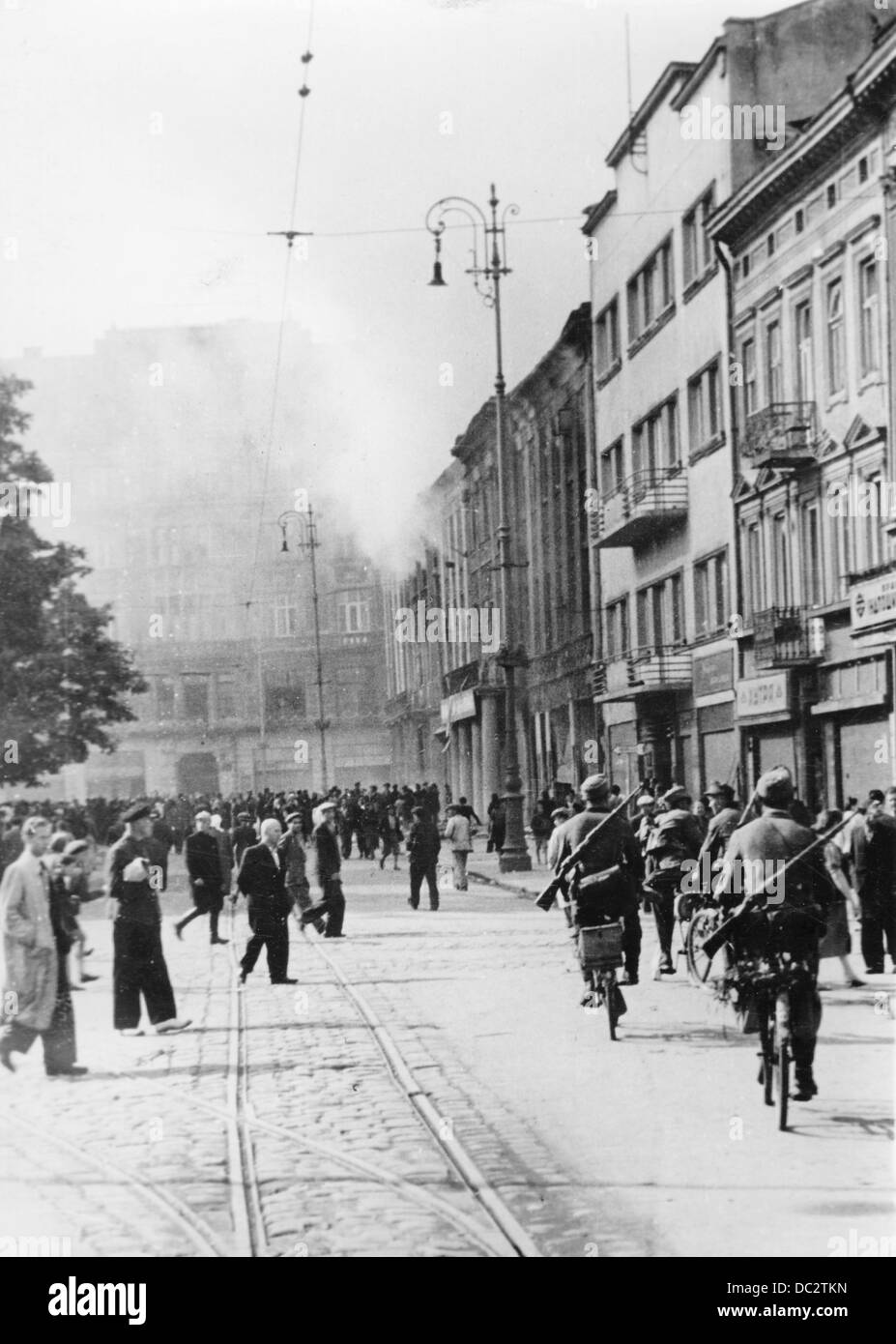 The Nazi Propaganda! on the back of the image reads: "German troops in ...