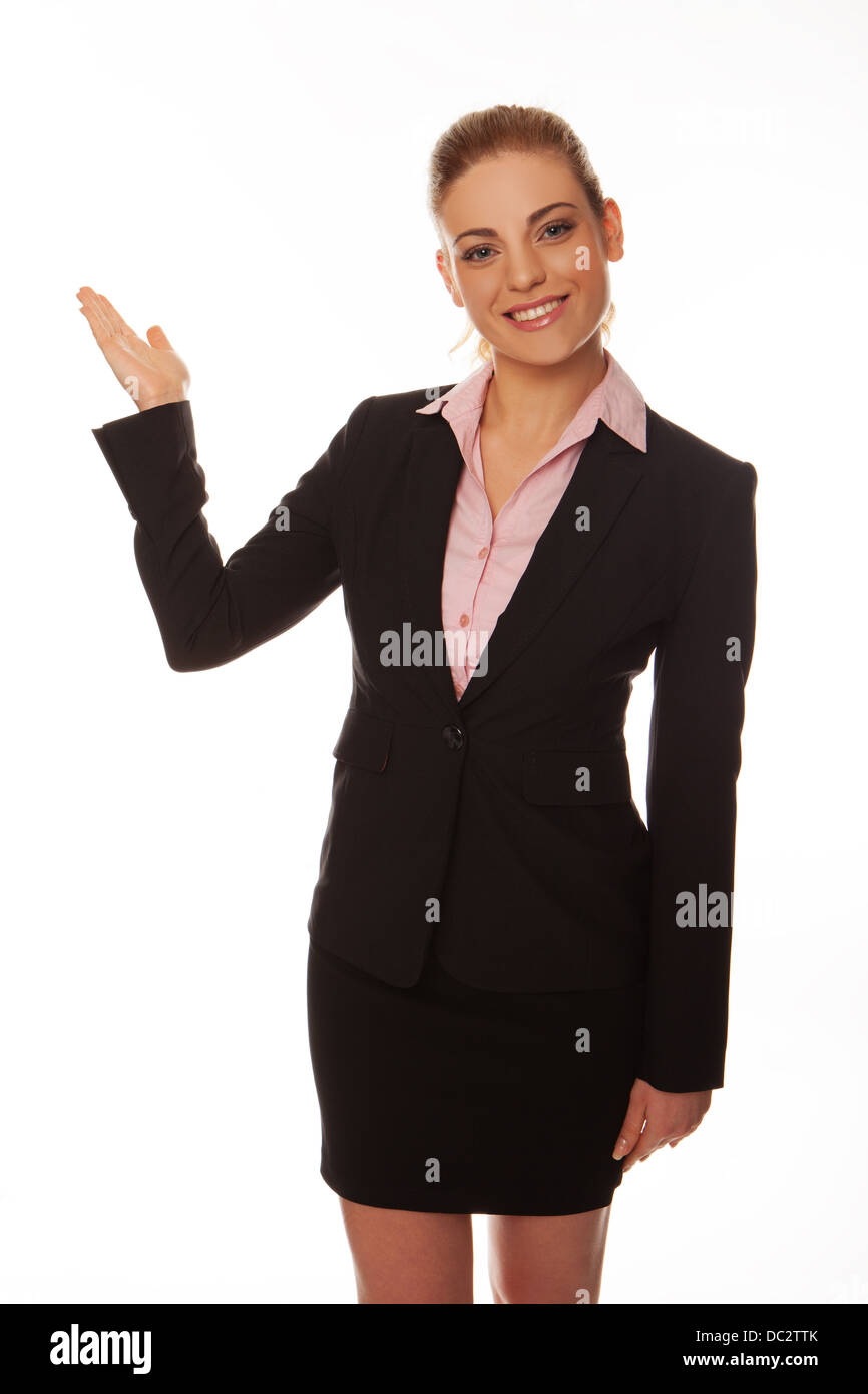 Smiling woman pointing with her hand Stock Photo - Alamy
