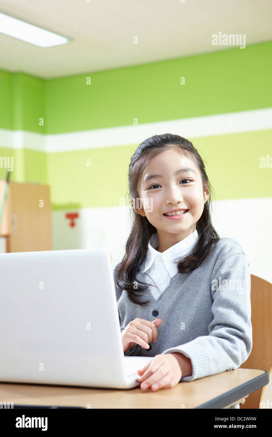 Child laptop school back of head hi-res stock photography and images ...