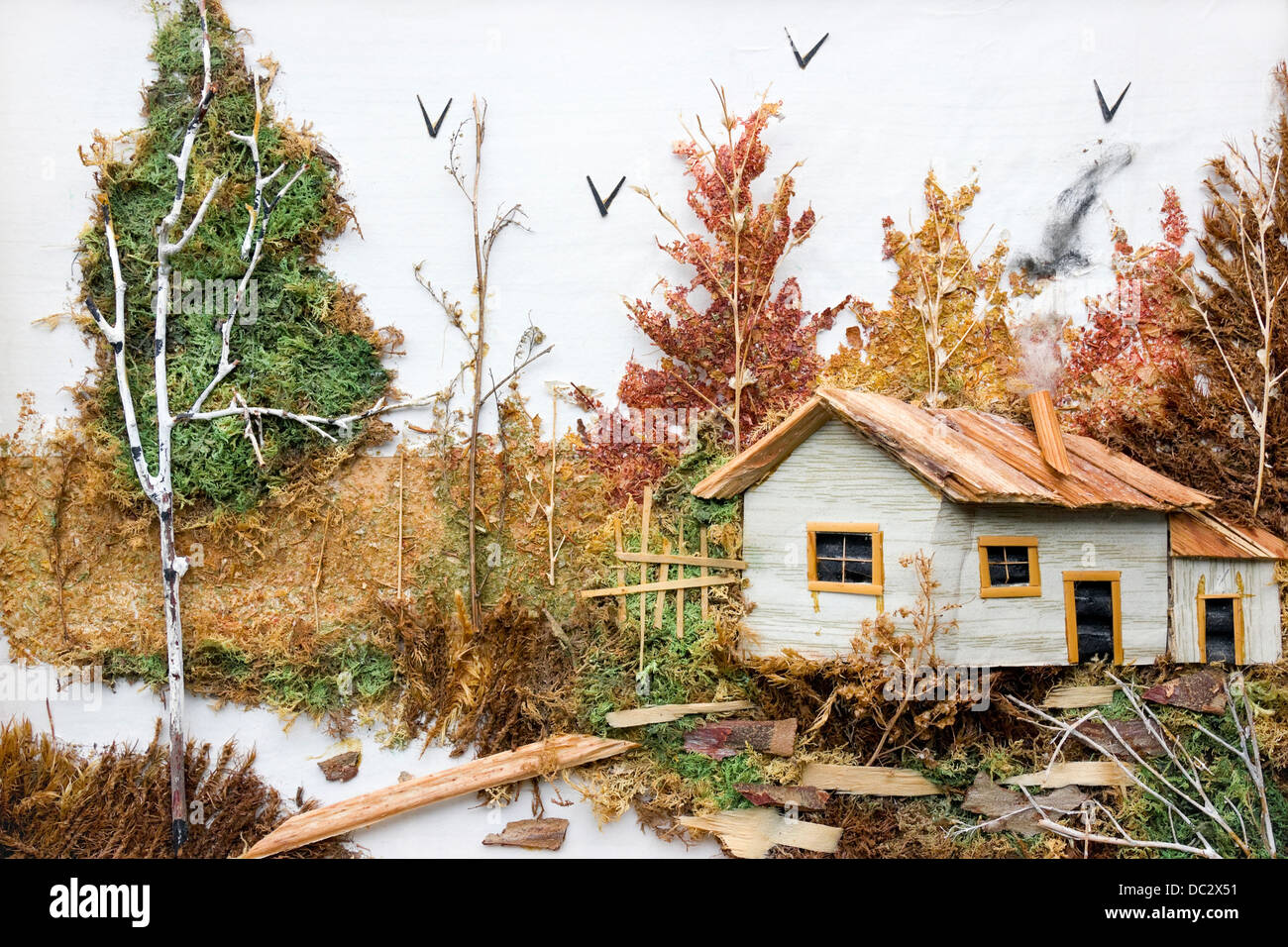 Autumn forest landscape with a rustic house is made of dry grass and ...