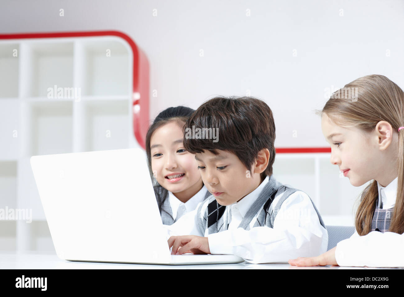 Kids with laptop hi-res stock photography and images - Alamy