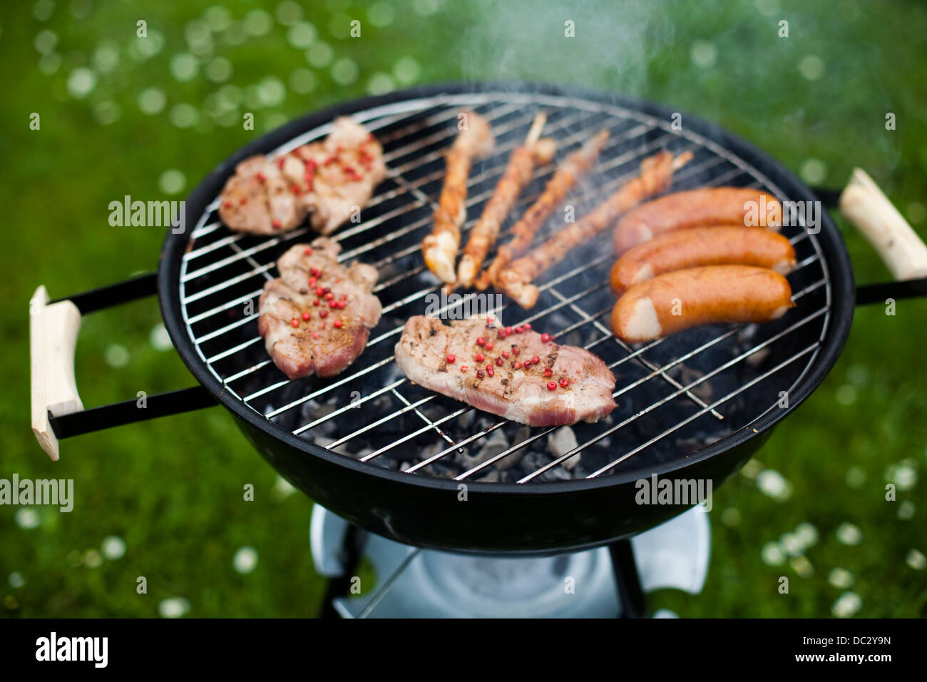 Barbecue a hot summer evening, Grilling Stock Photo - Alamy