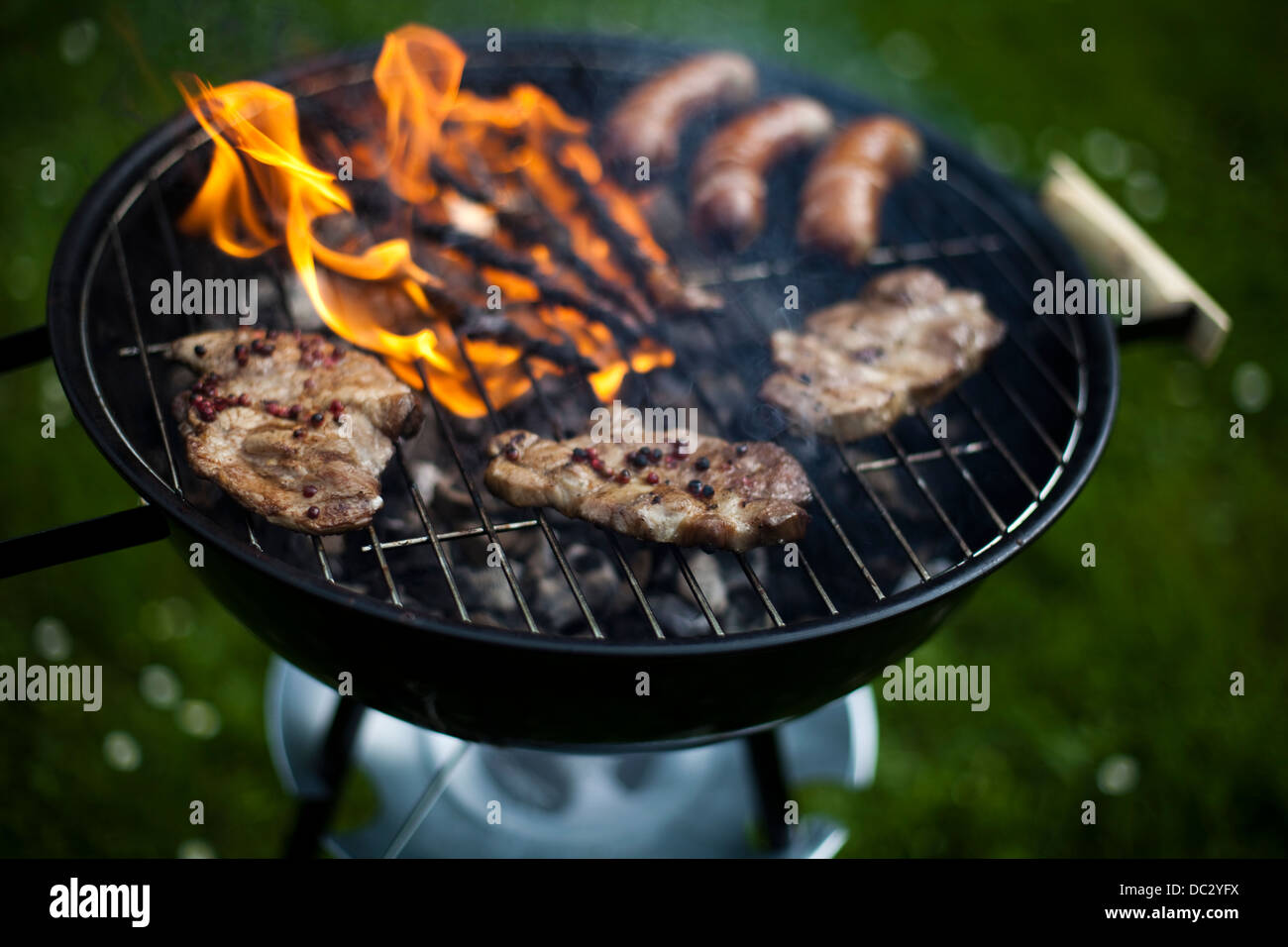 Barbecue a hot summer evening, Grilling Stock Photo - Alamy