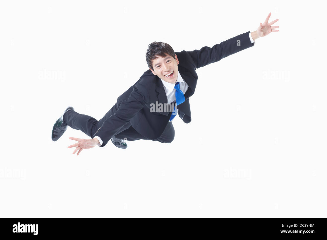a businessman flying in the air Stock Photo - Alamy