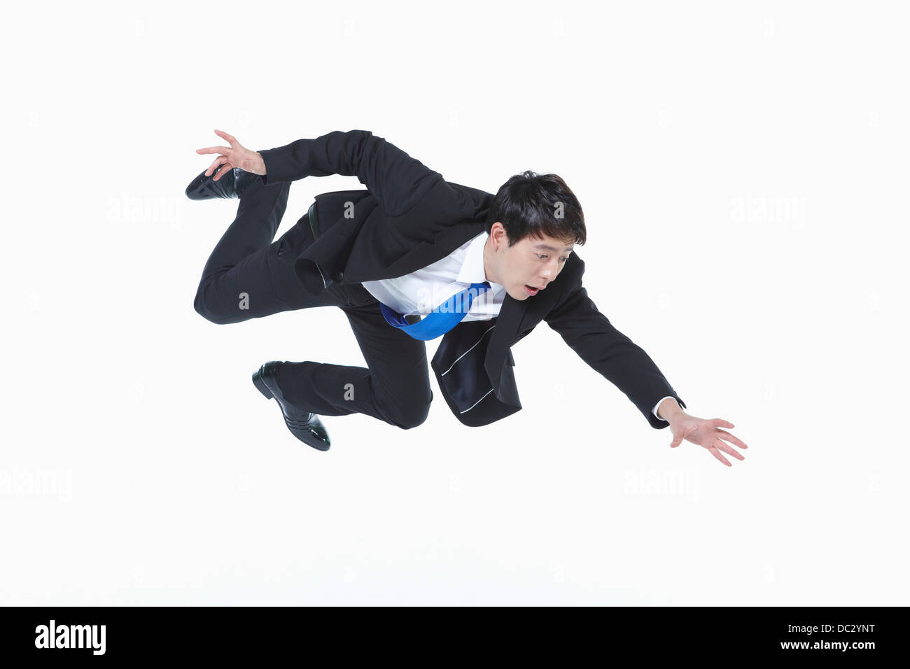 a businessman flying in the air Stock Photo - Alamy
