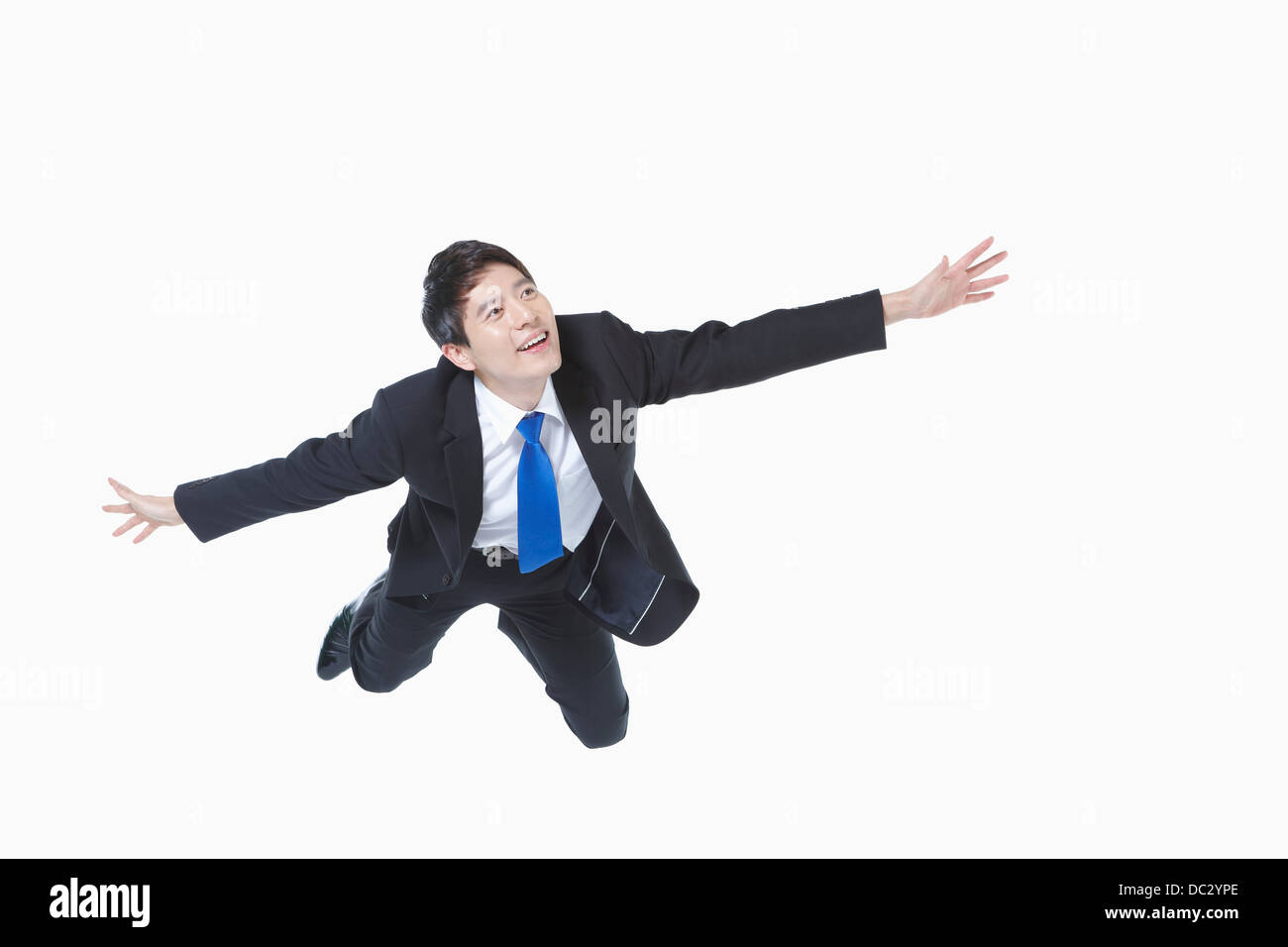 a businessman flying in the air Stock Photo - Alamy