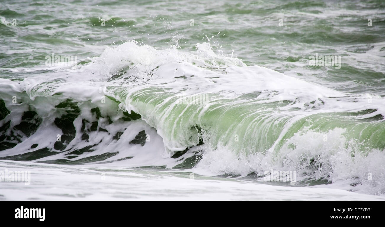 Wave breaking into calm water hi-res stock photography and images - Alamy