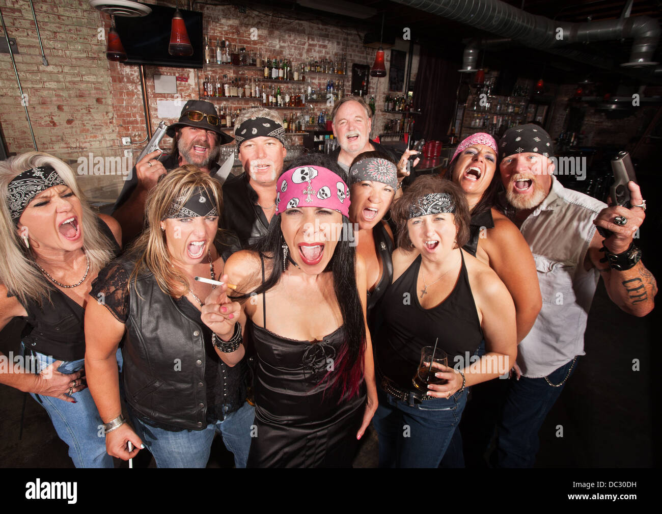 Biker Gang with Weapons and Drinks Stock Photo - Alamy