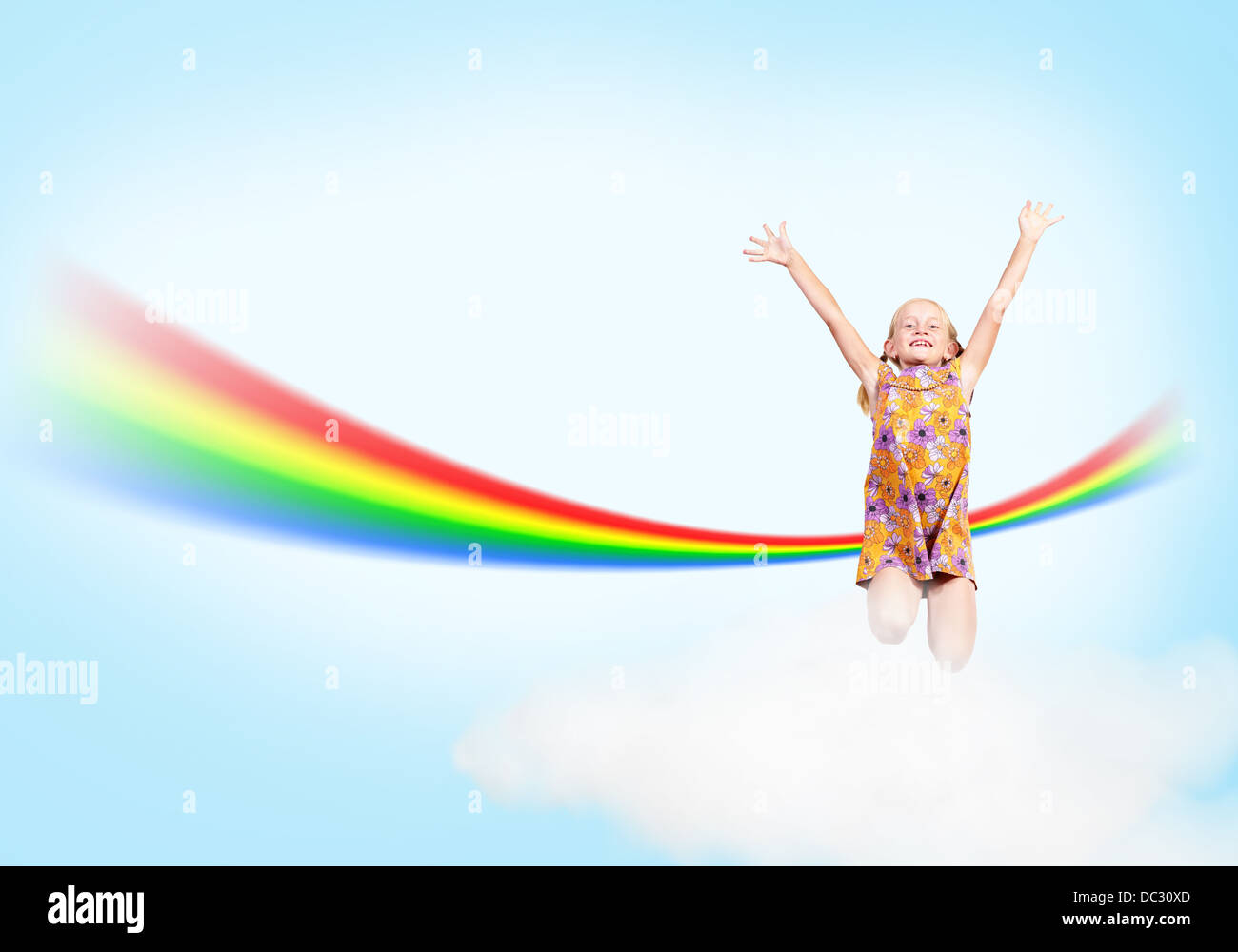 girl jumping on clouds and a rainbow Stock Photo - Alamy