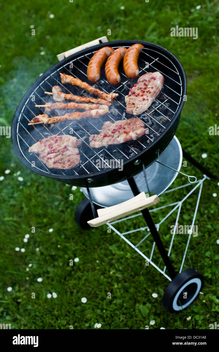 Barbecue a hot summer evening, Grilling Stock Photo - Alamy