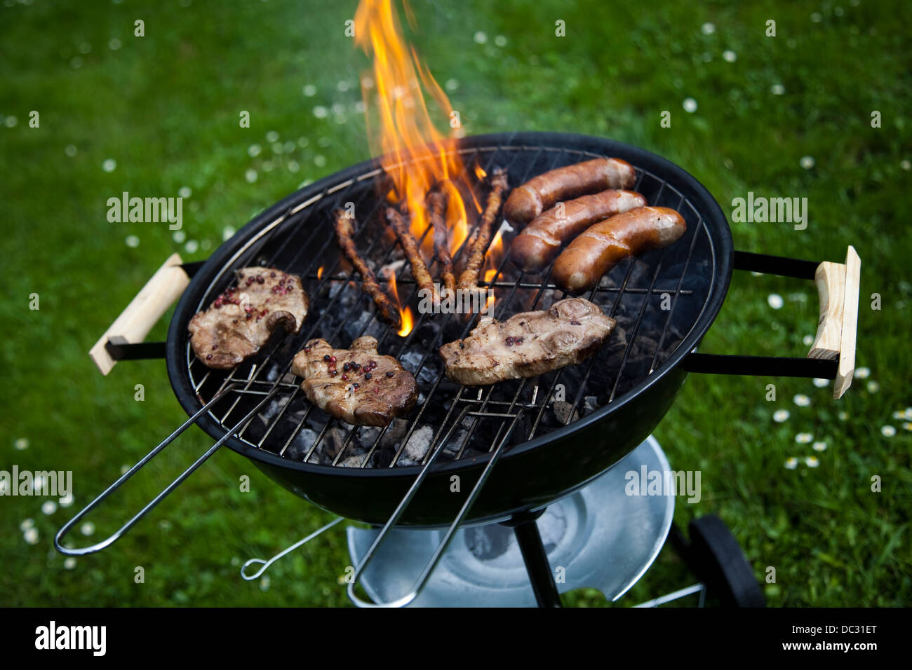Barbecue a hot summer evening, Grilling Stock Photo - Alamy