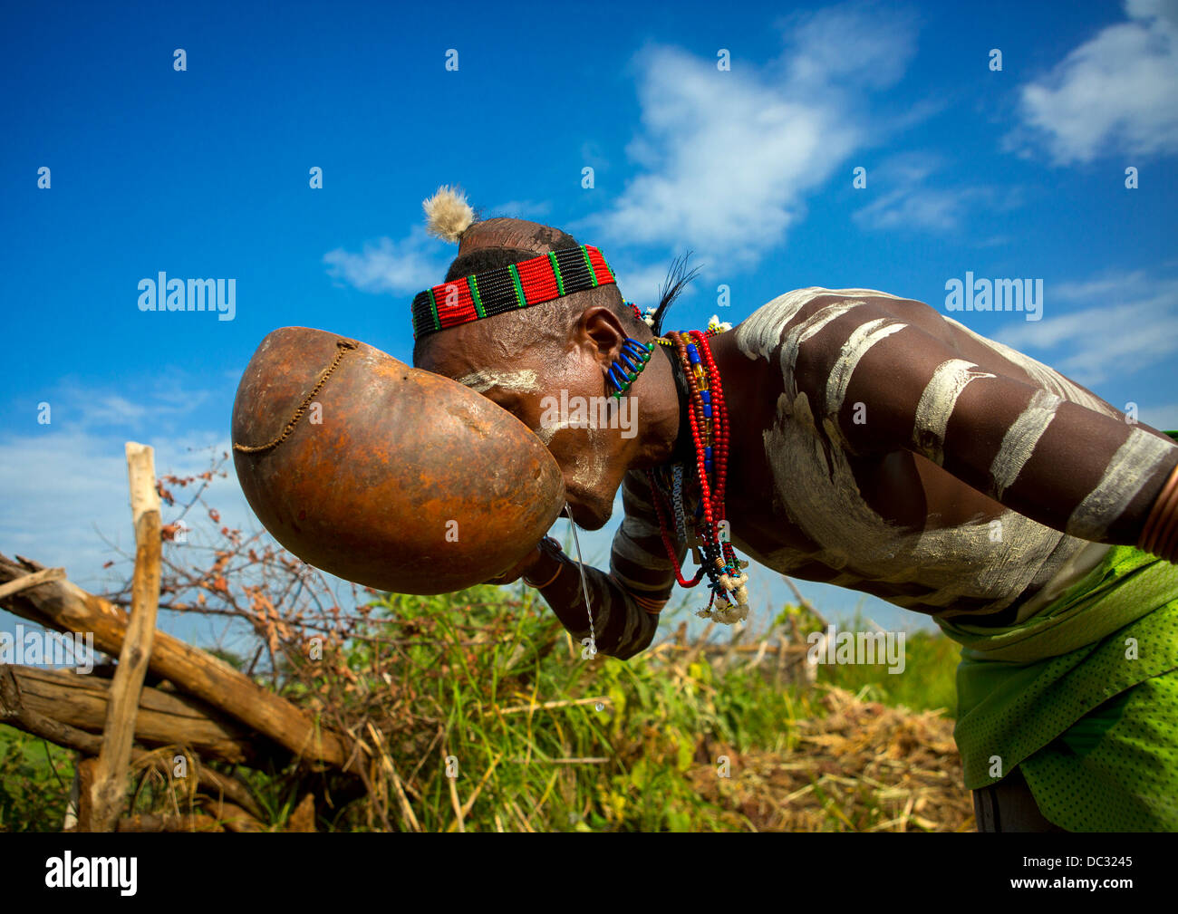 Bashada Tribe Man Drinking In A Calabash, Dimeka, Omo Valley, Ethiopia ...