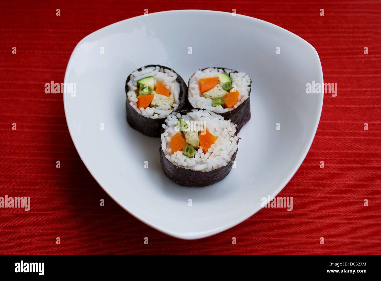 Vegetarian maki sushi rolls with rice, carrots, zucchini, green beans ...