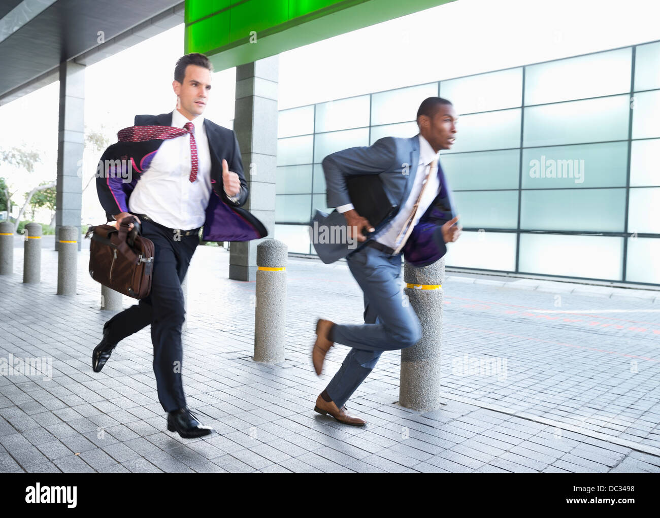 Running businessman briefcase on hi-res stock photography and images ...