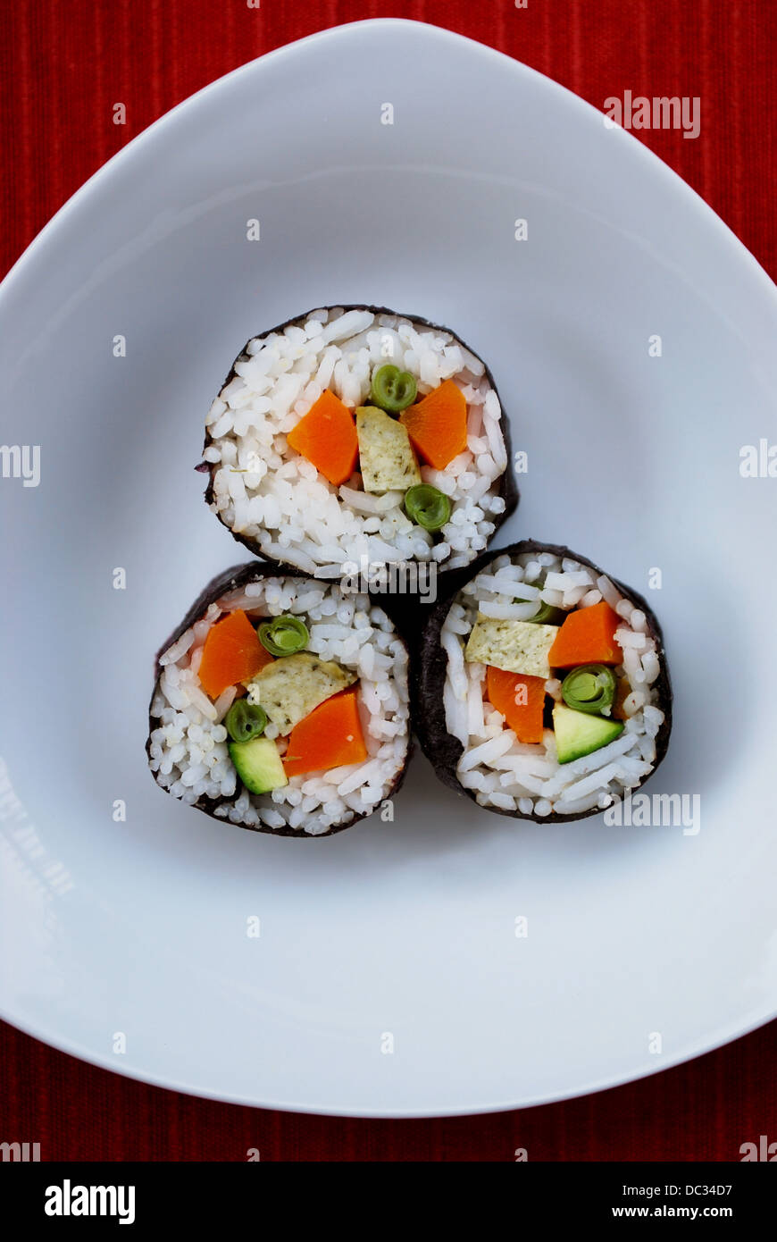 Vegetarian maki sushi rolls with rice, carrots, zucchini, green beans ...