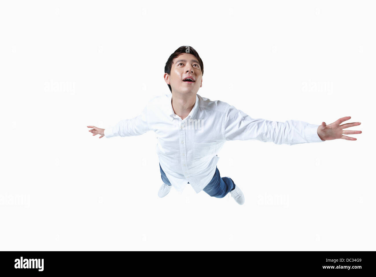 man with jeans flying in the air Stock Photo - Alamy