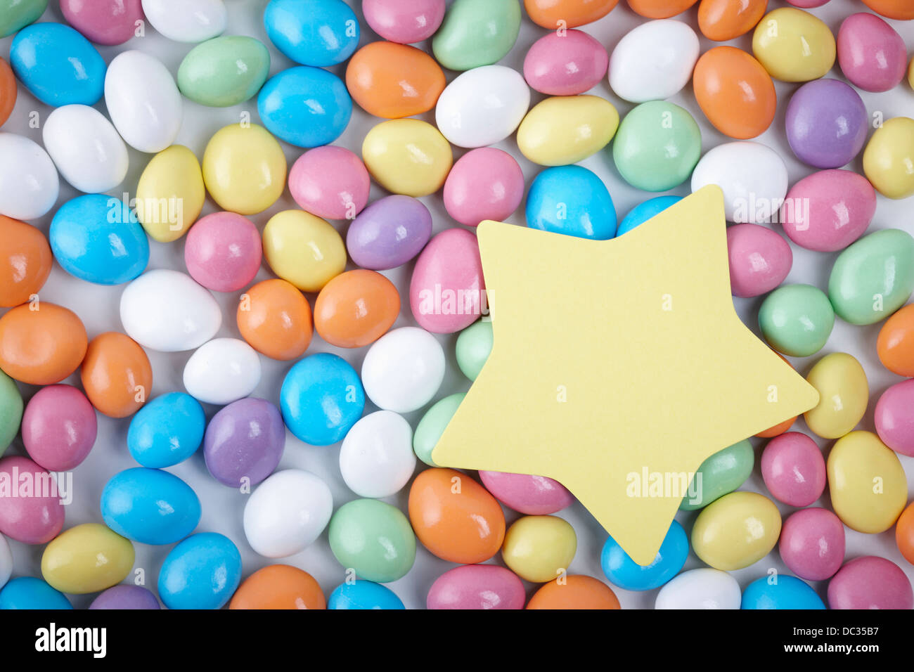 colourful candies with a star on top Stock Photo - Alamy