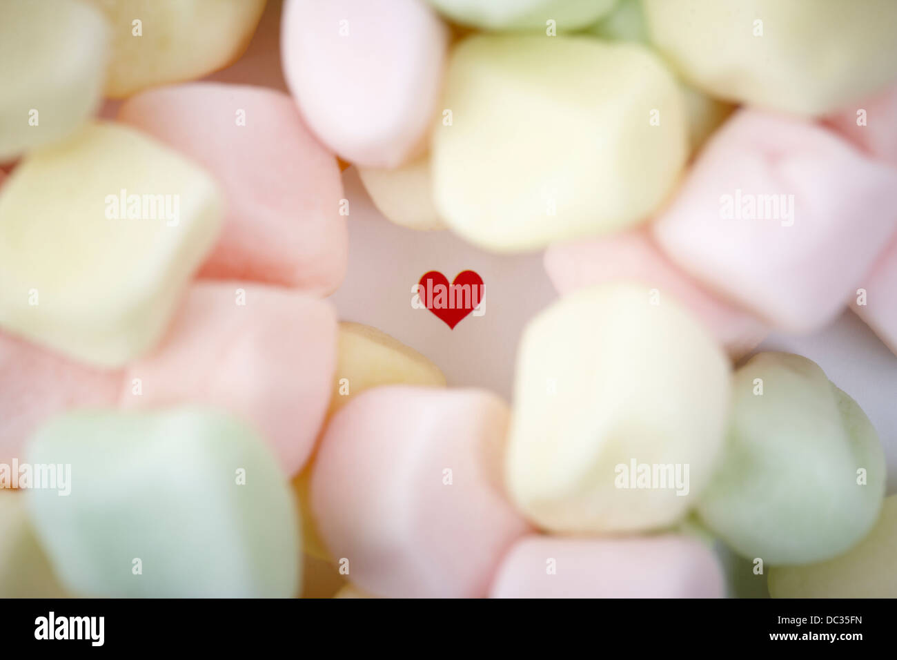 colourful marsh mellow with a heart in the middle Stock Photo - Alamy