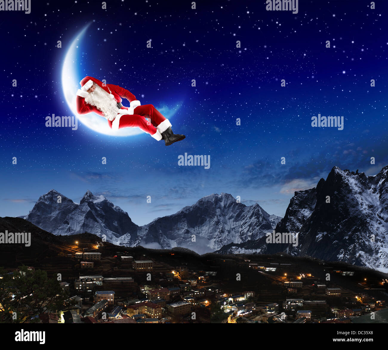 photo of santa claus sitting on the moon Stock Photo - Alamy