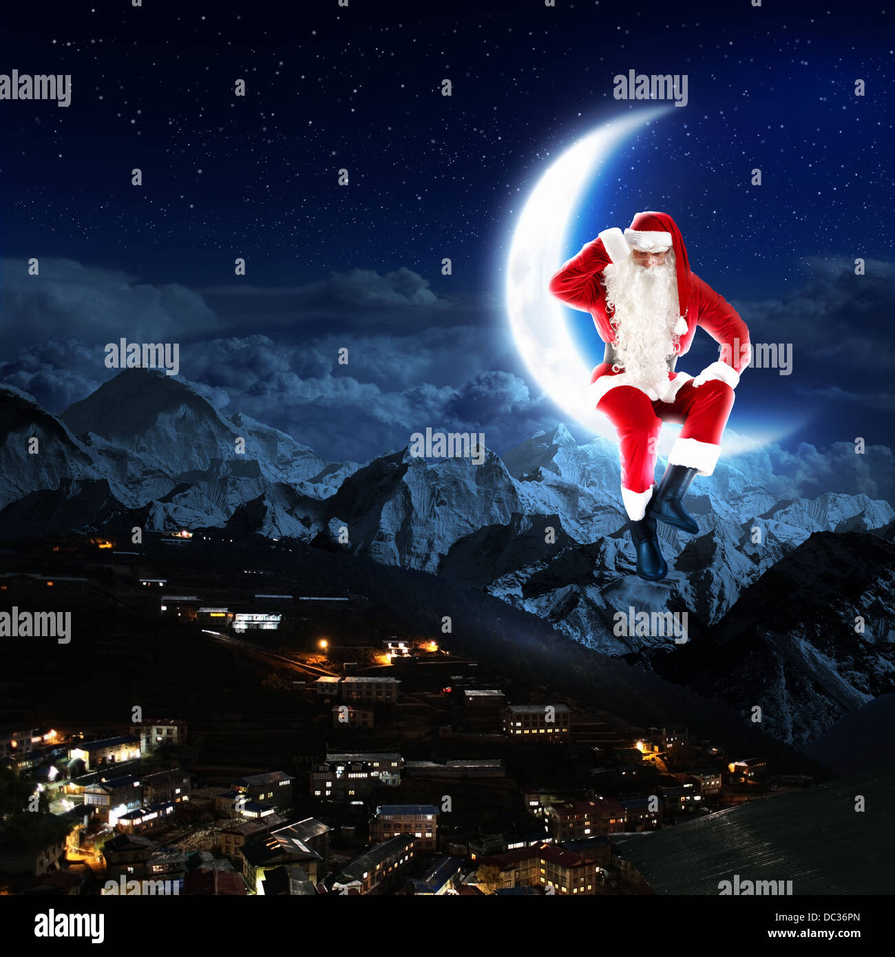 photo of santa claus sitting on the moon Stock Photo - Alamy