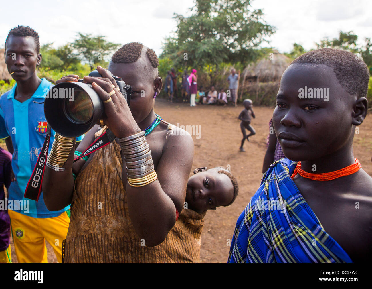 Bodi Tribe Woman Taking Piotures With A Canon Camera, Hana Mursi, Omo ...